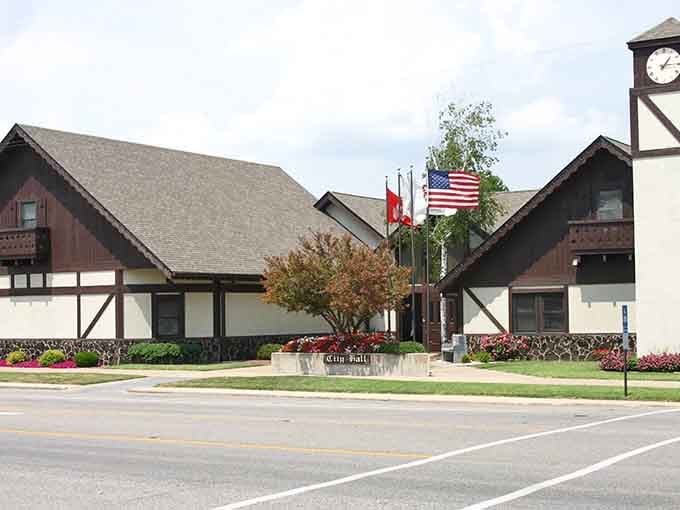 Bavarian-style architecture and proud flags celebrate heritage in a town where traditions are cherished, not forgotten completely.