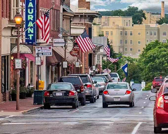 American flags waving over storefronts remind you that small-town pride never goes out of style here.