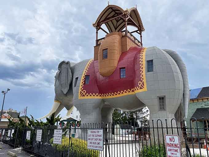 That ornate saddle detail and those tusks against the evening sky—whimsical architecture that's pure seaside magic.
