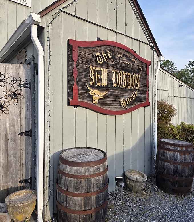 That weathered wooden sign with rustic barrels tells you authentic country cooking awaits, no pretense required here.