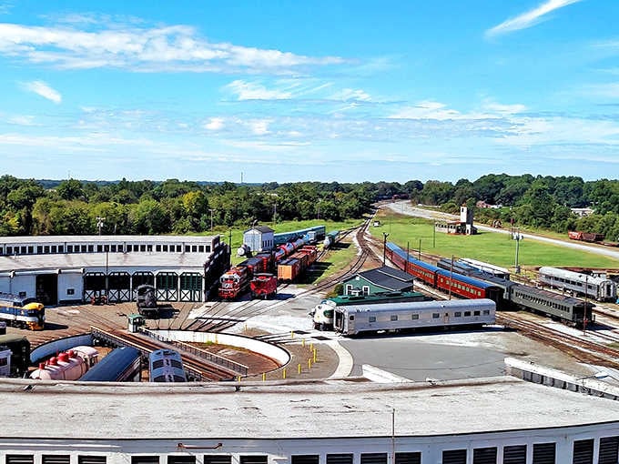 The sprawling rail yard showcases a rainbow of historic trains, each one a chapter in America's transportation story.