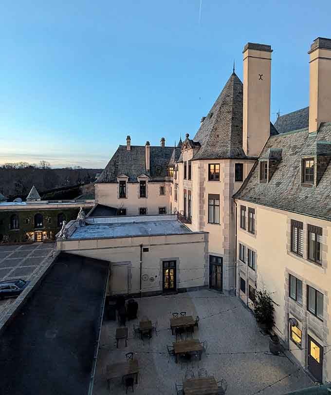As twilight settles over the estate's elegant rooflines, you can almost hear champagne glasses clinking at a Parisian soir&eacute;e.