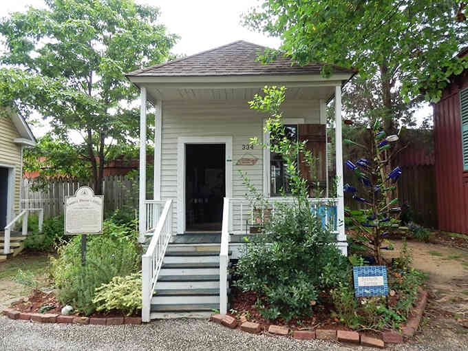 This charming cottage with its welcoming porch shows how families lived when neighbors actually knew each other.