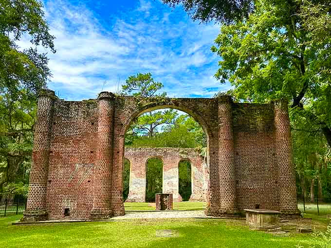 The grand archway frames distant ruins perfectly, creating a hauntingly beautiful window into South Carolina's rich colonial history.