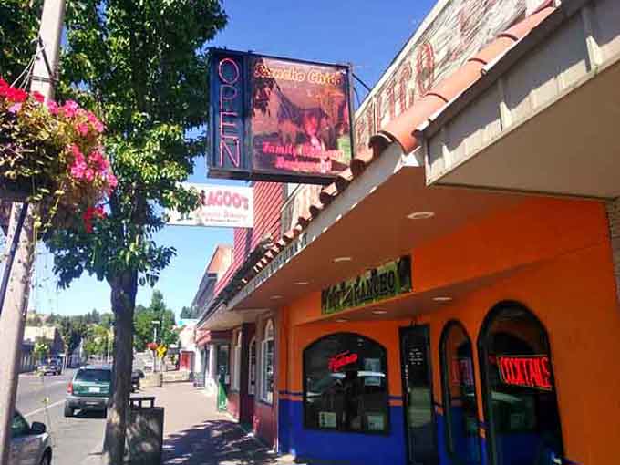 Bold orange and pink storefronts add personality to downtown, showing that affordable doesn't mean boring or cookie-cutter.