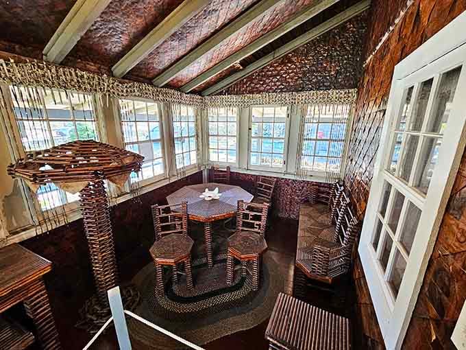 Rolled newspaper furniture and walls demonstrate how yesterday's headlines became today's most creative recycling project ever attempted.