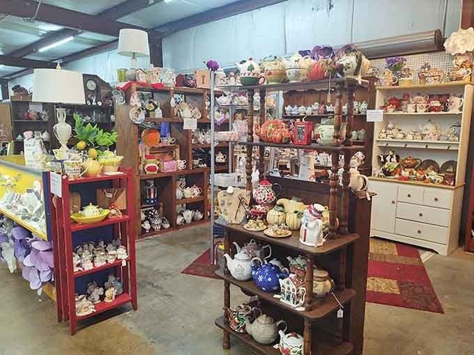 Vintage teapots and collectibles crowd these shelves like a grandmother's china cabinet expanded to glorious, browsable proportions.