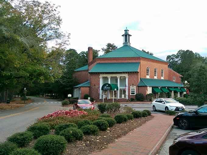 That distinctive copper-green dome catches the golden hour light like a beacon welcoming everyone home to gather.