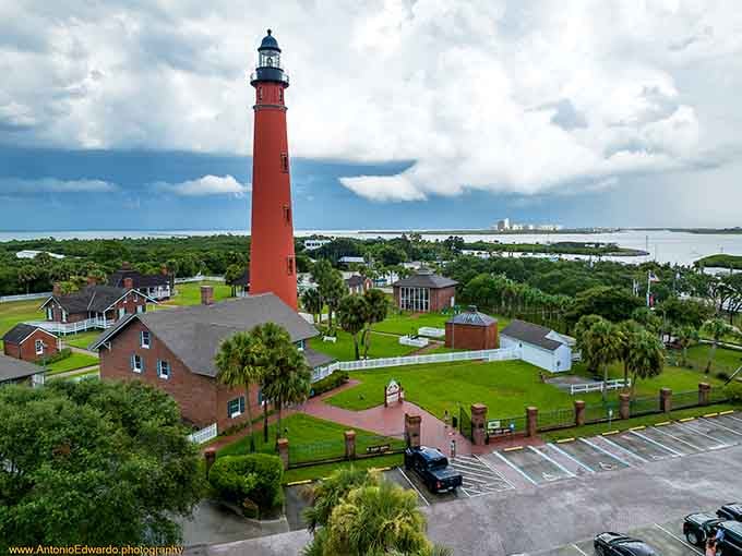 The aerial view reveals the full scope of this historic complex, with buildings arranged like a small village dedicated to maritime safety.