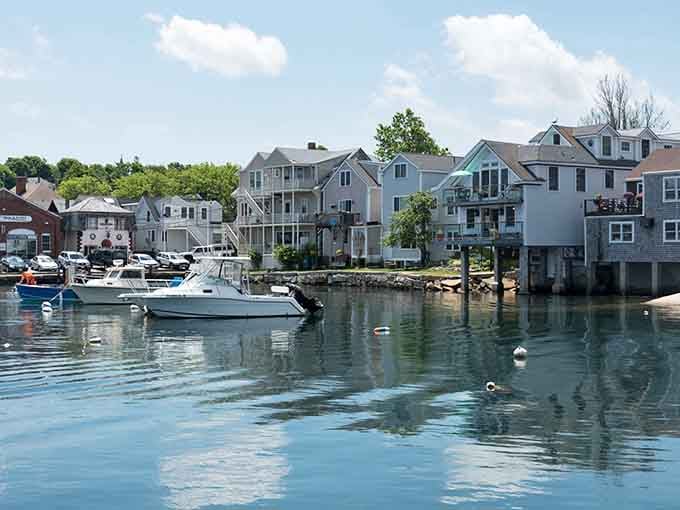 Pastel-painted houses cluster around calm waters, proving that life really can be this picture-perfect without even trying too hard.