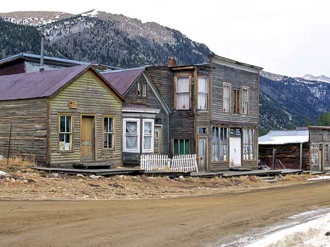 Mountains loom over these tilting buildings where time stopped and the Wild West still feels wonderfully alive.