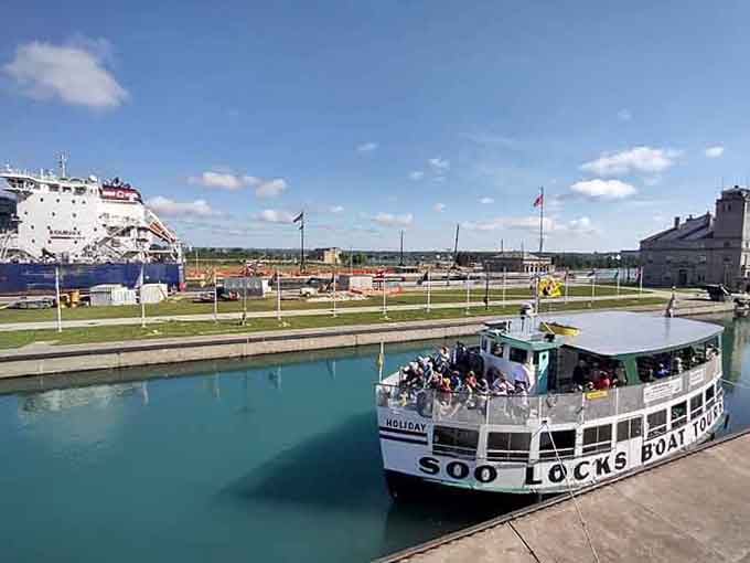 The tour boat waits patiently as freighters prepare to rise or fall through this ingenious lock system.