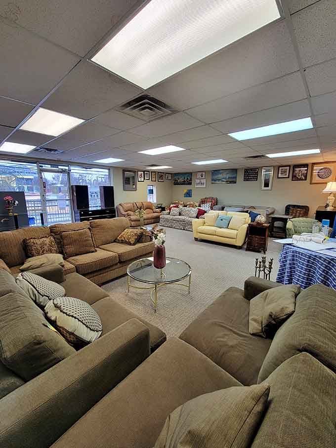 Comfortable couches arranged like a living room showroom prove that gently used furniture can still look absolutely perfect.