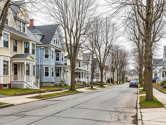 Tree-lined streets showcase colorful Victorian homes with welcoming porches perfect for watching the world go by.