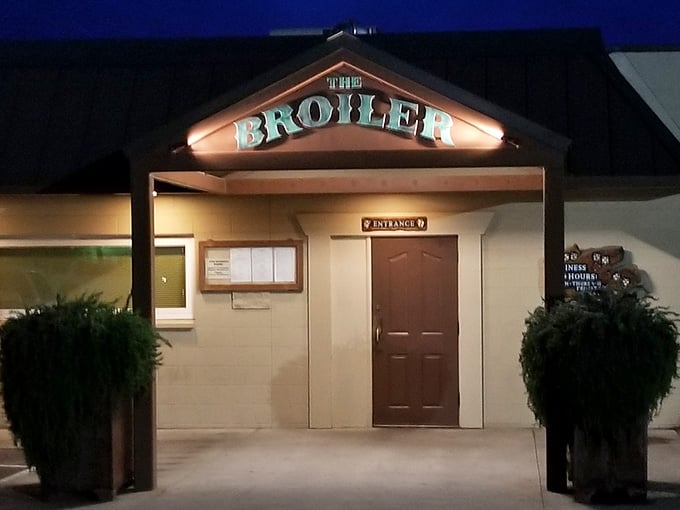 Evening lights transform this unassuming spot into a warm invitation for serious steak lovers everywhere.