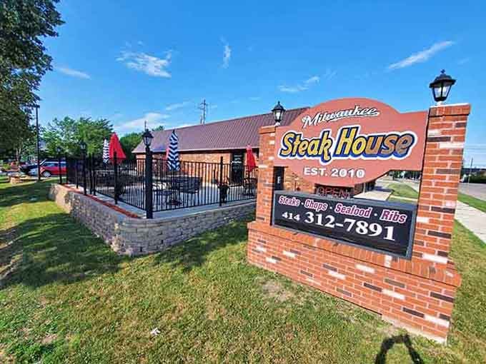 That welcoming patio with lanterns and flags creates the perfect spot for enjoying quality beef in casual comfort.