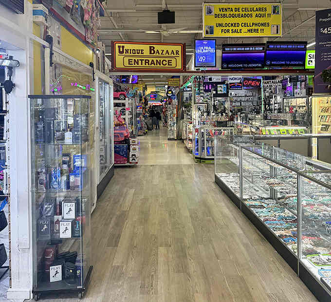 The Unique Bazaar entrance glows with yellow signage promising an international marketplace experience right in your own backyard.