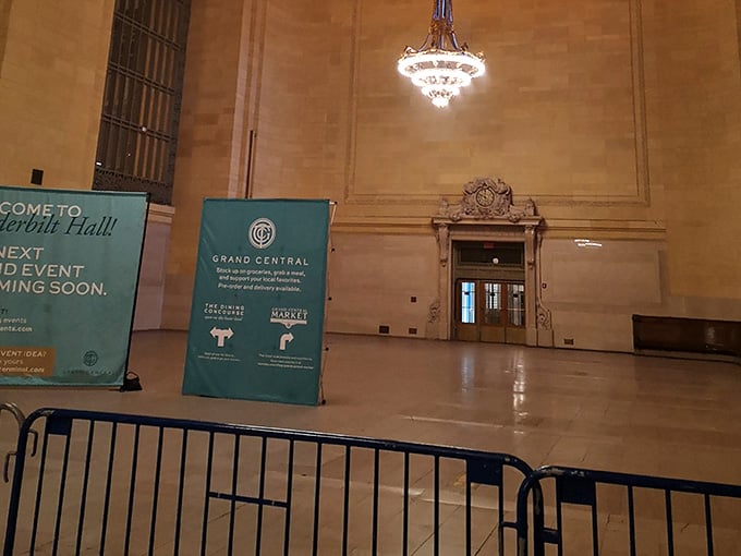 Inside the terminal's lower level, ornate ceilings create acoustic magic where whispers travel like secret messages.