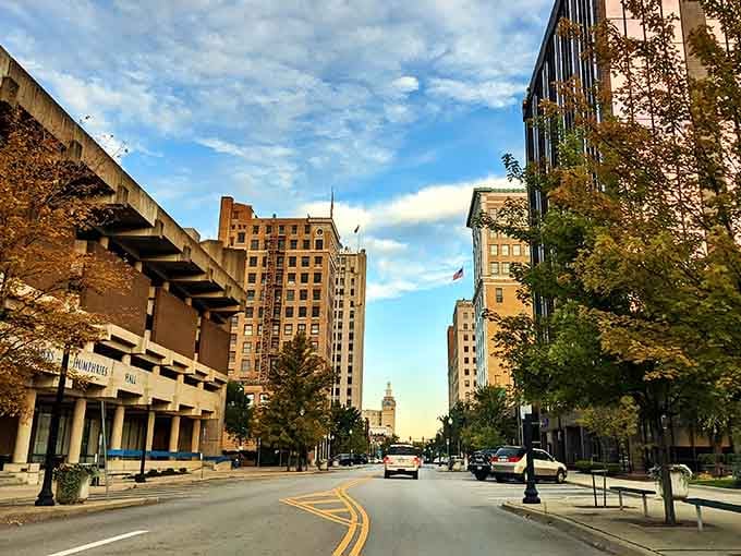 Autumn trees soften the urban landscape where vintage buildings stand proud against surprisingly affordable living costs.