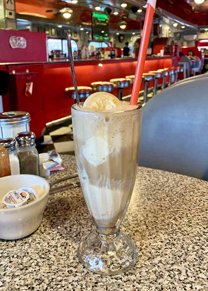 Root beer floats served in classic glasses remind you that some pleasures improve with age and nostalgia.