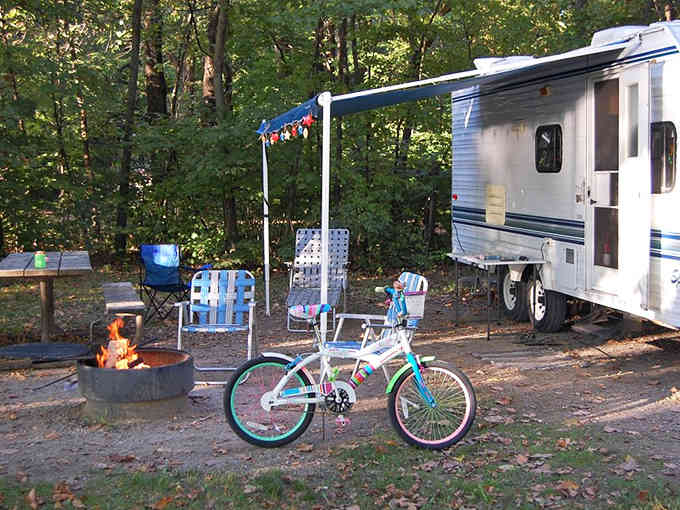 Local campgrounds offer lakeside spots where families create memories without requiring a second mortgage.