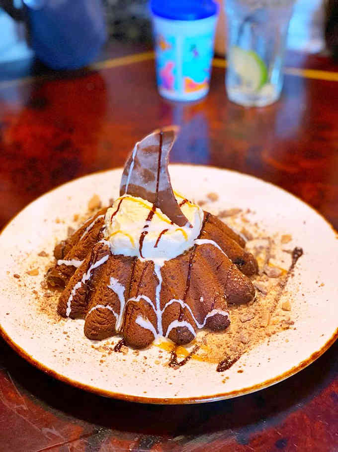 This chocolate volcano dessert erupts with whipped cream and graham cracker crumbs for a sweet finale.