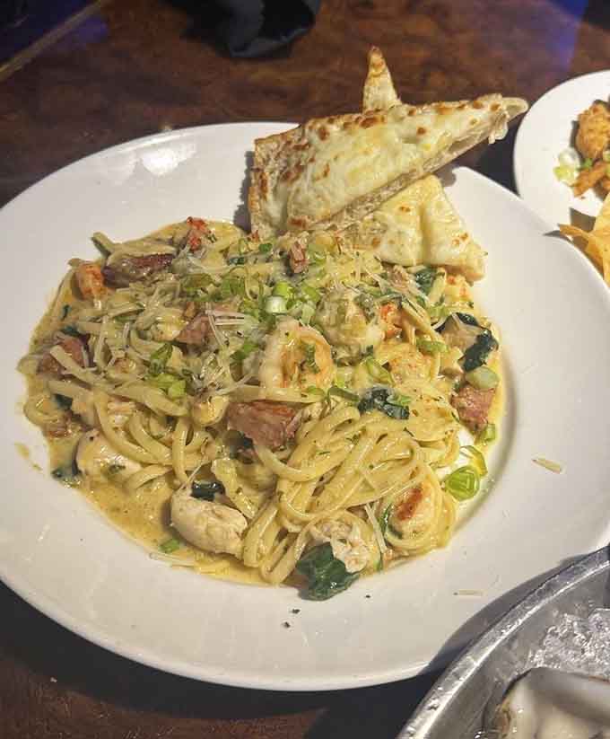 Louisiana flavors swimming in pasta like they've been planning this delicious conspiracy for years together.