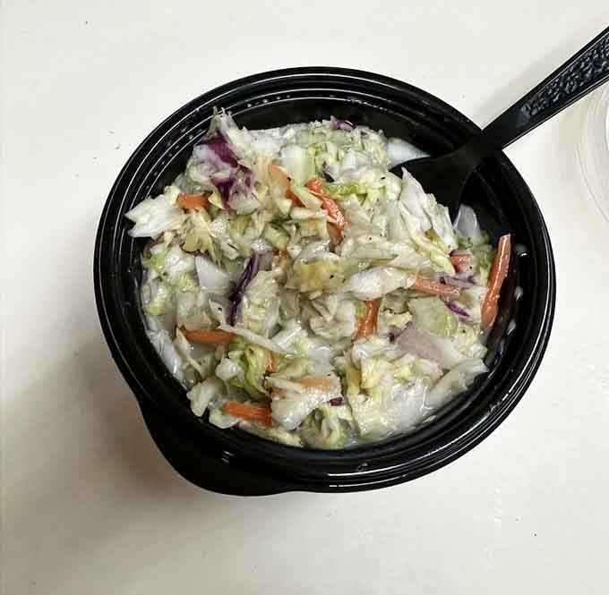Creamy coleslaw that knows its job is supporting the stars, not stealing the show from all that meat.