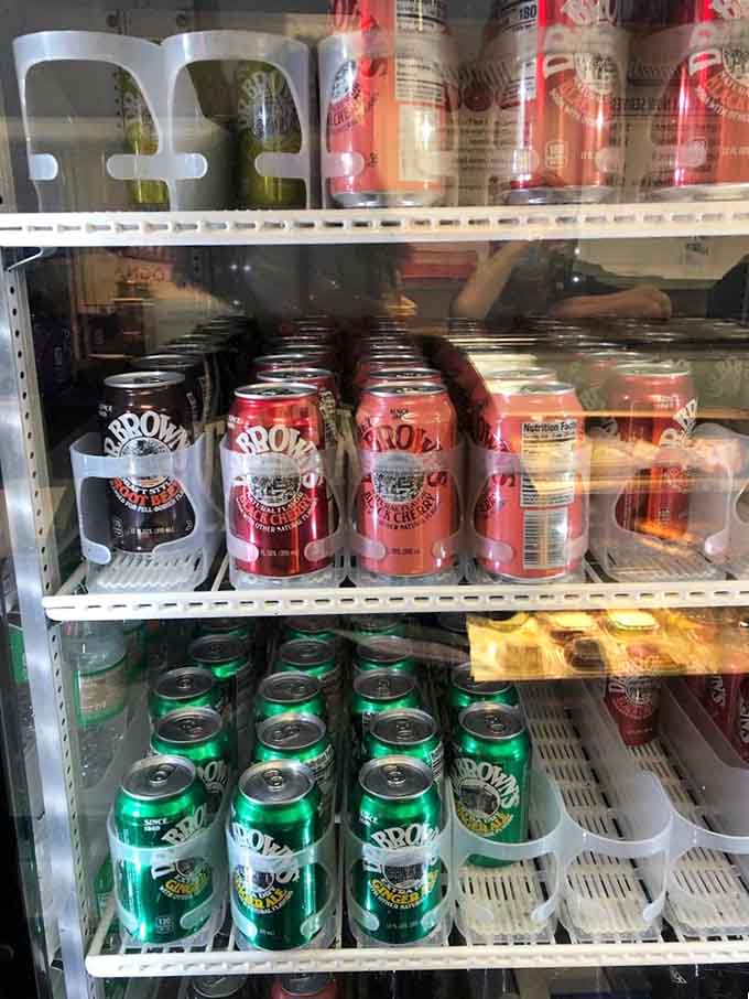 Classic sodas lined up like soldiers ready to wash down your magnificent meat mountain with style.
