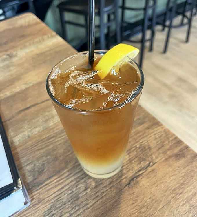 A refreshing Arnold Palmer hits different when you're contemplating which incredible pizza to order next.