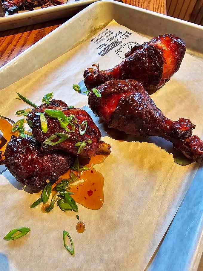 Those glazed wings with their caramelized exterior look like they could convert a vegetarian faster than you can say "drumstick."