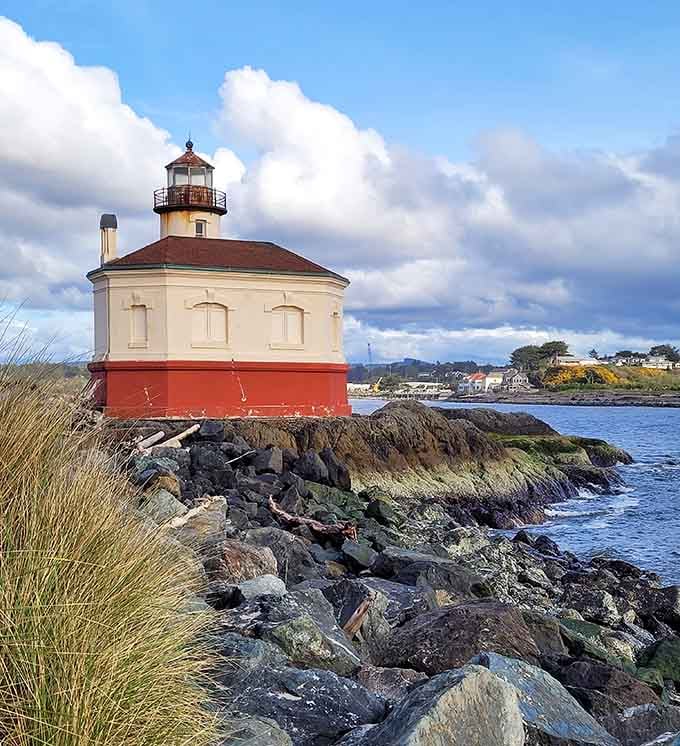 Coquille River Lighthouse stands sentinel where river meets ocean, a postcard-perfect piece of coastal history and charm.