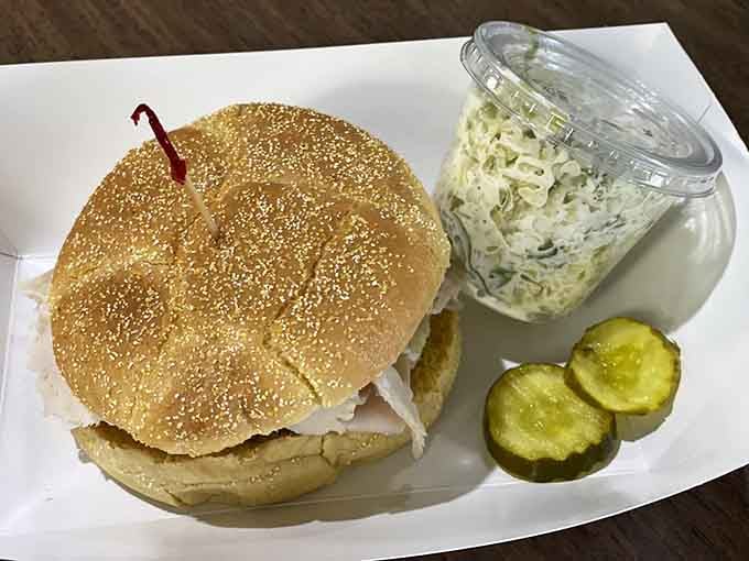 The Gobbler sandwich comes with coleslaw and pickles, because even turkey needs proper accompaniment for the full experience.