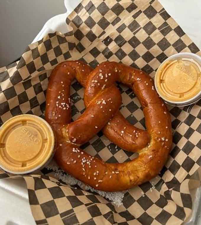 This pretzel is bigger than your head and comes with dipping sauces that'll make you weep with joy.