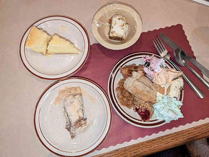 The dessert spread where shoofly pie and cheesecake coexist peacefully, unlike your belt and waistband soon.