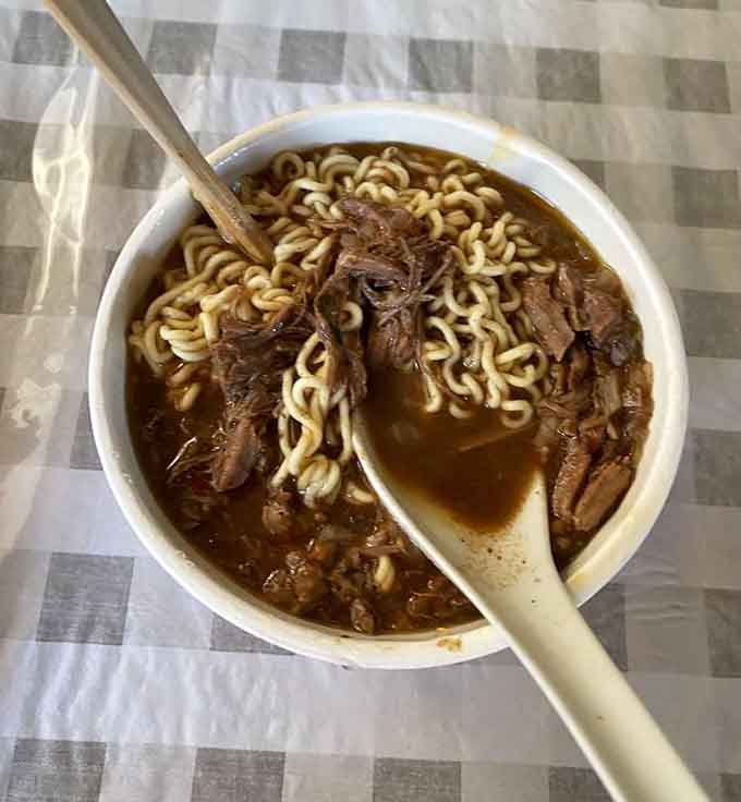 Birria meets ramen in this fusion bowl that shouldn't work but absolutely does, defying all culinary logic beautifully.
