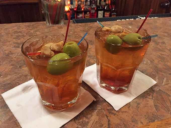 Wisconsin Old Fashioneds garnished with enough olives to qualify as a vegetable serving, if you're feeling optimistic.