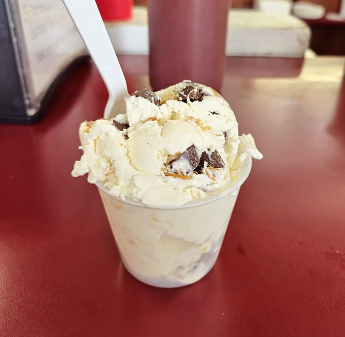 Ice cream topped with whipped cream and cookie chunks, because sometimes more really is more after all.