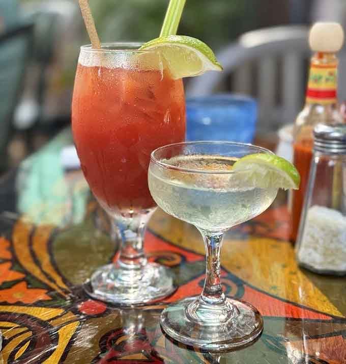 A Key lime martini that looks like liquid sunshine decided to take a vacation in a glass.