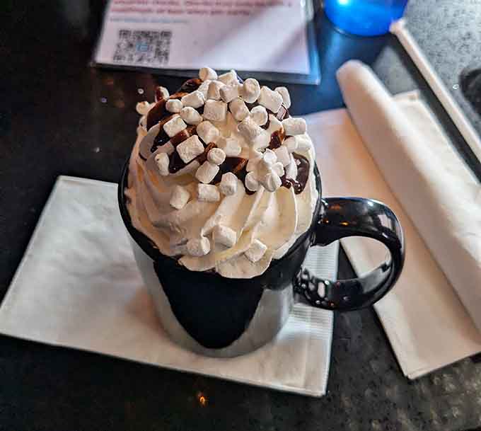 Hot chocolate piled high with whipped cream and mini marshmallows, because adults deserve to feel like kids sometimes too.