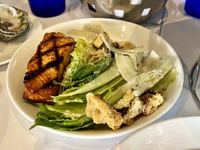 Grilled salmon transforms a Caesar salad from supporting player to headlining act, and everyone in the audience wins tonight.