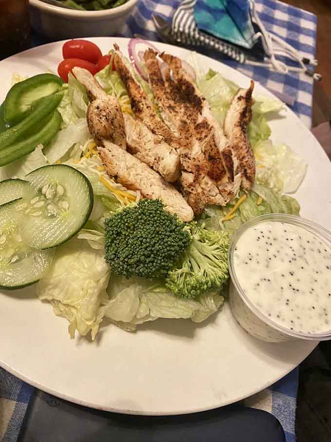 Grilled chicken atop fresh greens with crisp vegetables shows that Blue Springs does lighter fare just as well as hearty plates.