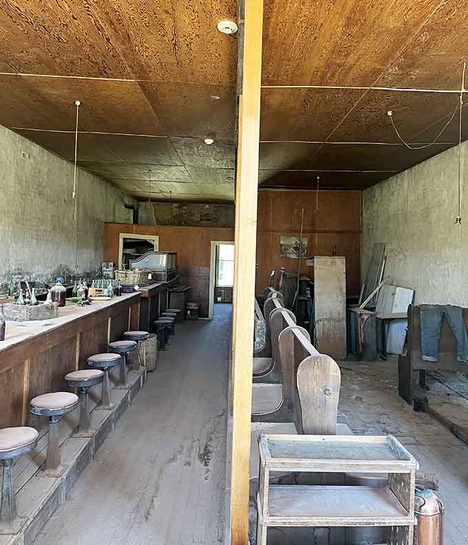 The saloon interior still has its bar stools lined up, waiting for patrons who'll never order another round.