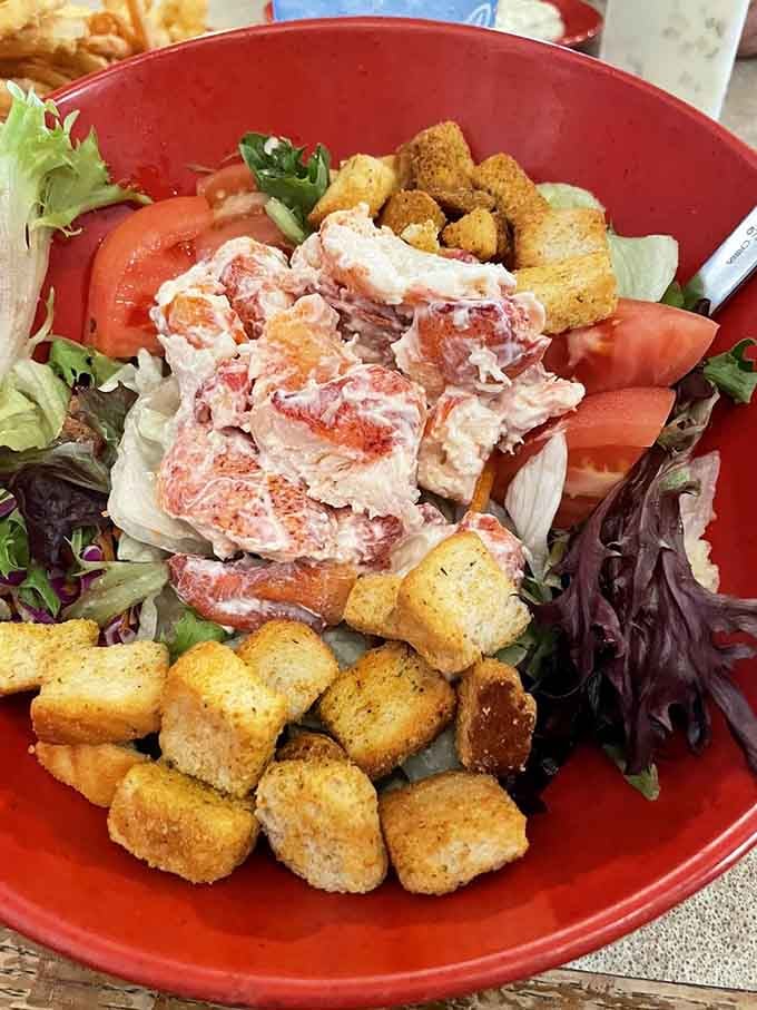 This lobster salad with golden croutons is what happens when New England meets your lunch break dreams.