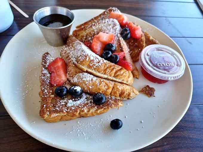 French Toast dusted with powdered sugar and crowned with berries makes mornings worth celebrating again.