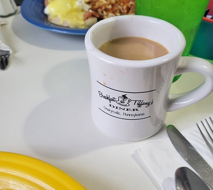 Hot coffee in a classic diner mug with the restaurant's name is like getting a warm hug before noon.