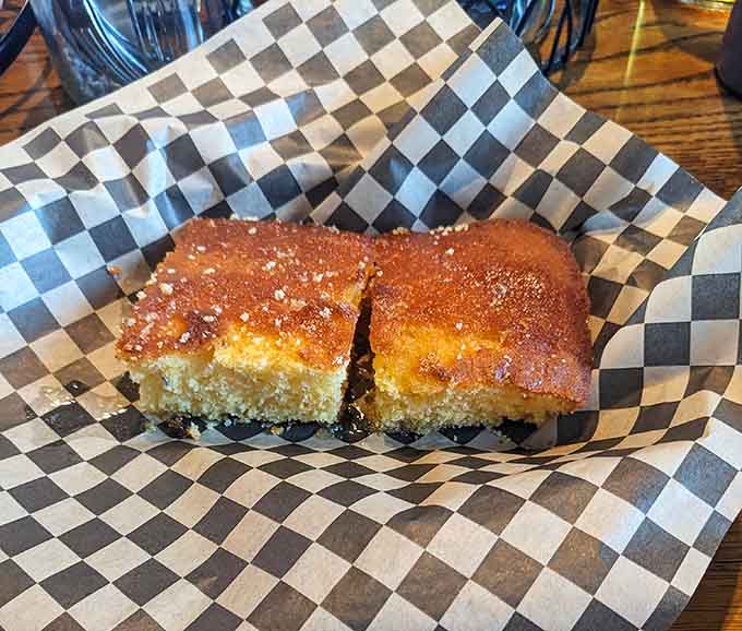 Golden cornbread dusted with cinnamon sugar transforms a Southern staple into something unexpectedly sweet and wonderful.