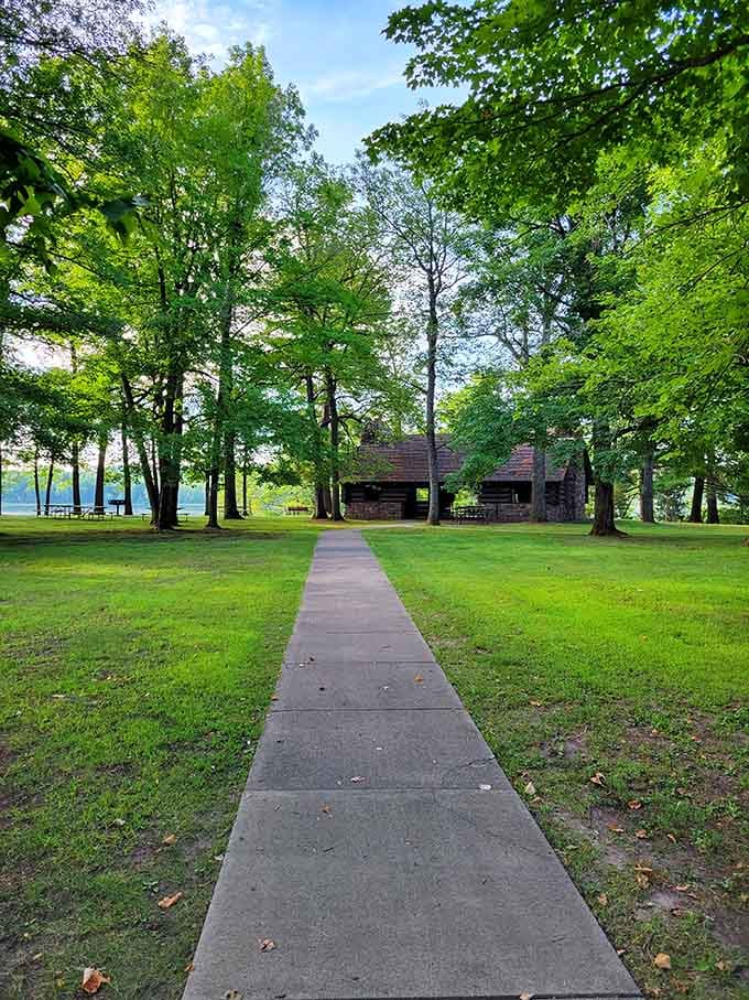 The pathway to those rustic shelters looks like something from a simpler time, when life moved at walking speed.