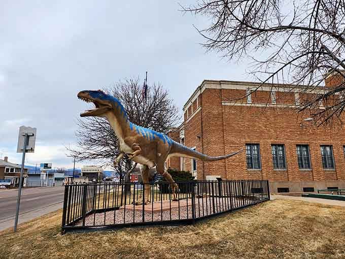 A dinosaur guards the museum entrance because apparently even prehistoric creatures appreciate good local history and culture.