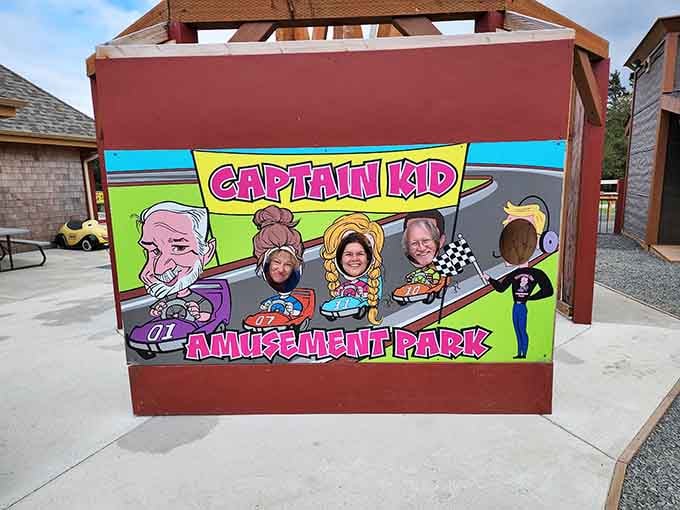 The Captain Kid photo board lets families stick their faces through cartoon cutouts, embracing gloriously cheesy fun.